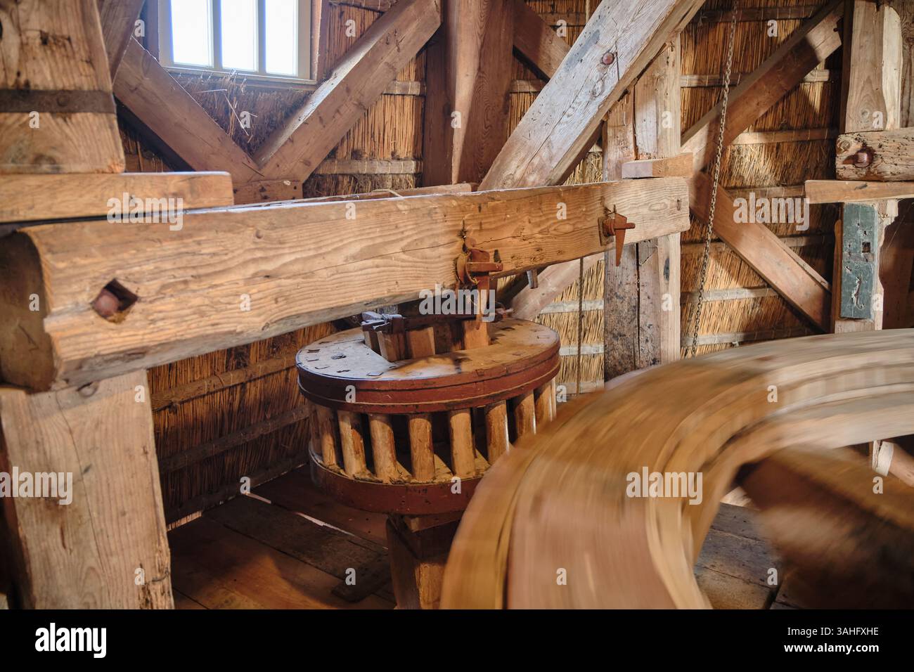 March 10, 2025 - Spijk, Netherlands: Rotating gear wheel and stationary ...