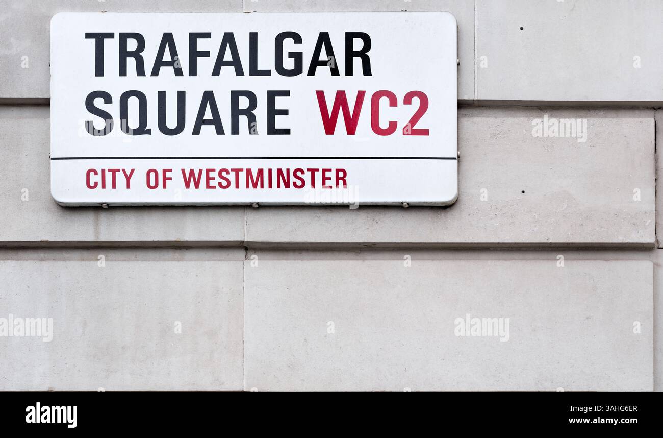 Street sign for Trafalgar Square, City of Westminster, London WC2 ...