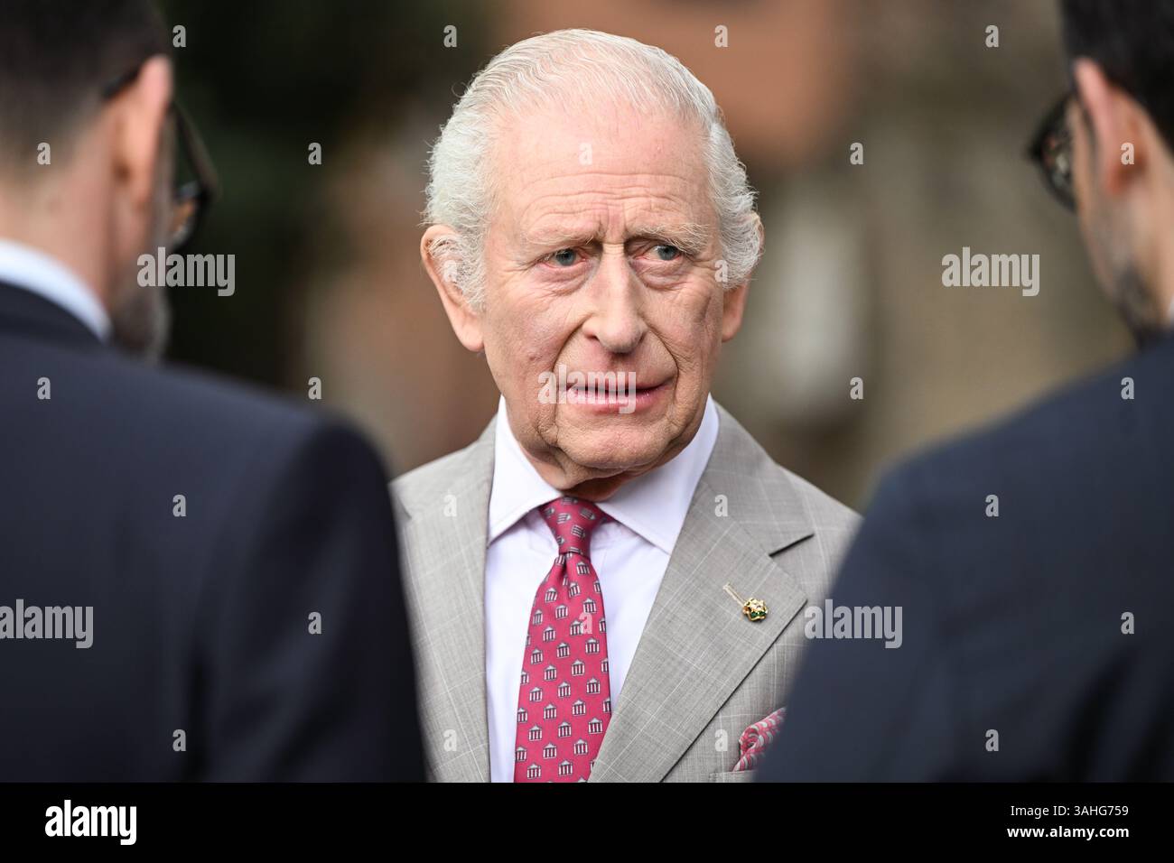 King Charles III unveils a plaquue after planting a tree donated by ...