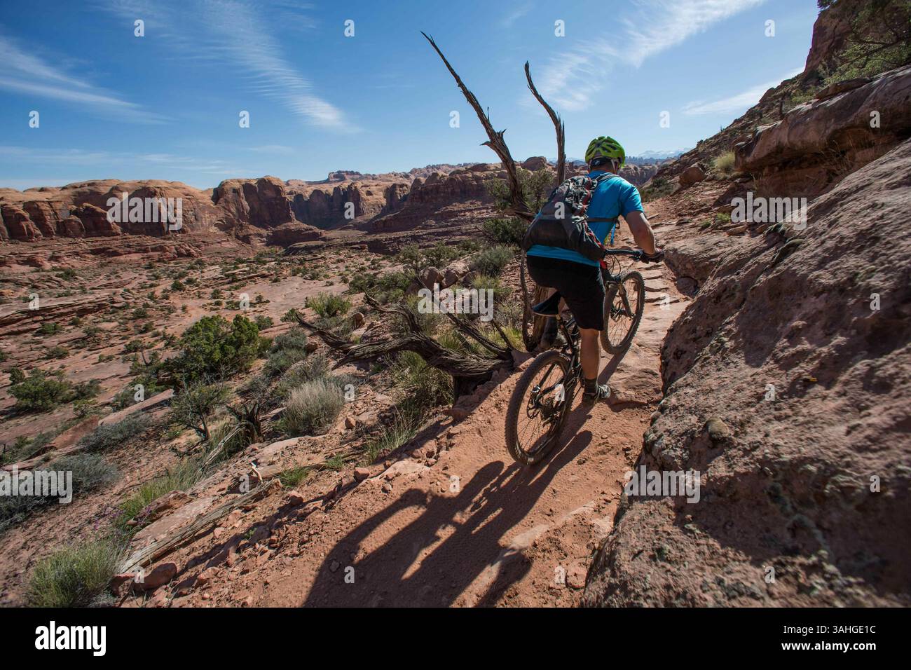 Apr 5, 2015 - Moab, Utah, U.S. - Mountain biker TIM LANE riding the red ...