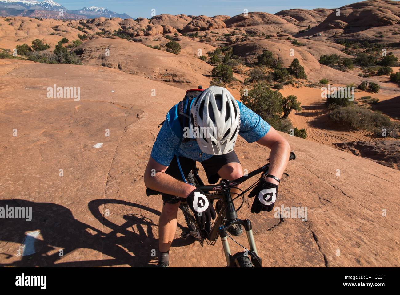 Apr 5, 2015 - Moab, Utah, U.S. - Tired mountain biker TIM LANE takes a ...