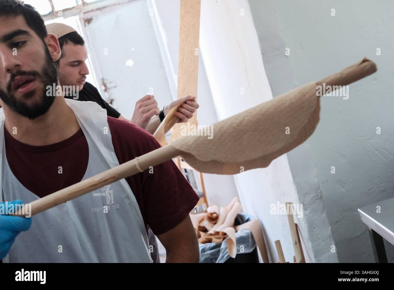 Jerusalem, Israel. 10th April, 2025. Jewish men prepare matzah ...