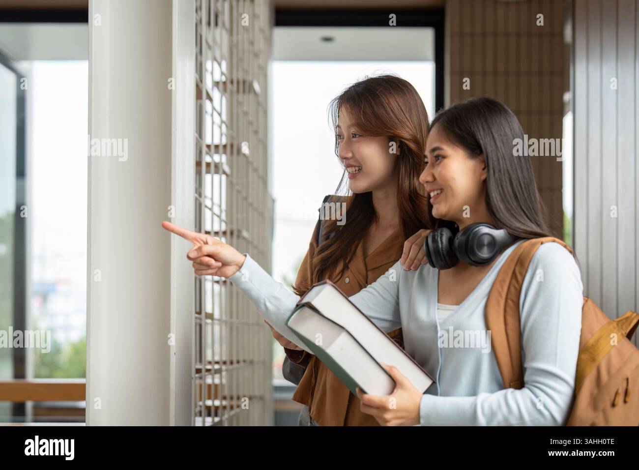 Exploring Opportunities and Campus Life. Two students excitedly ...