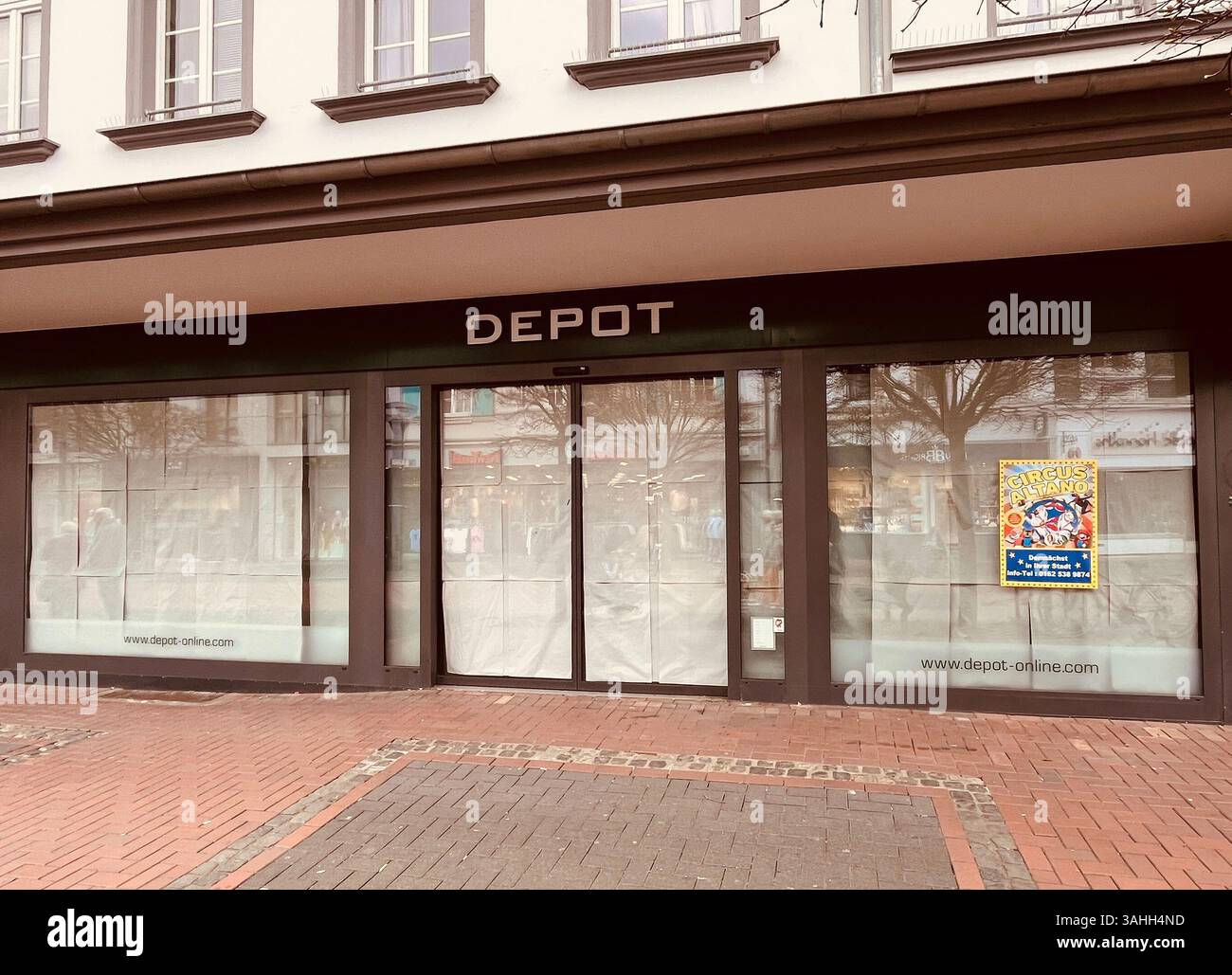 Hilden, Germany. 26th Mar, 2025. A closed branch of the Depot deco ...