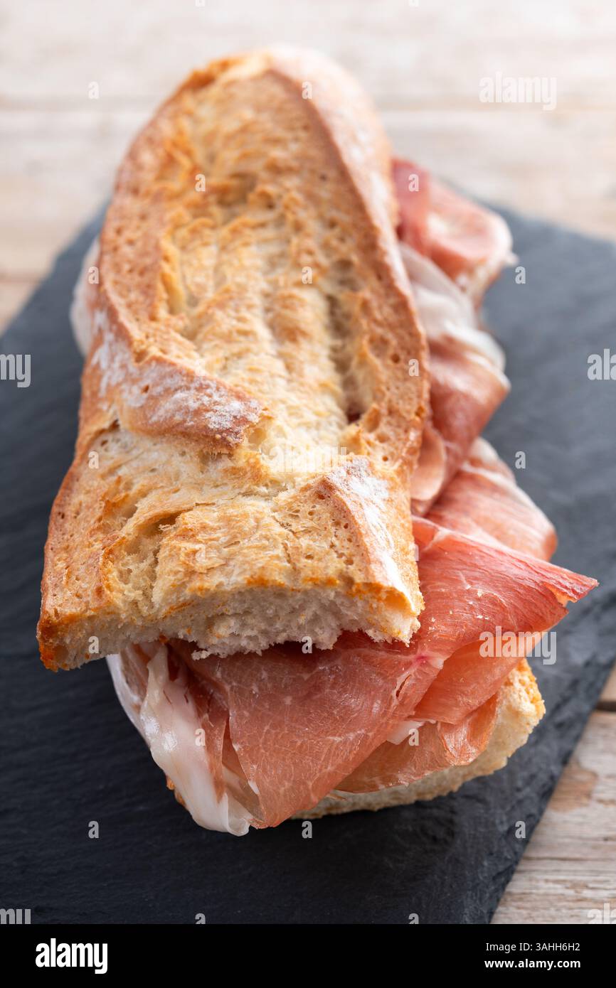 Spanish serrano ham sandwich. Spanish bocadillo de jamon serrano Stock ...