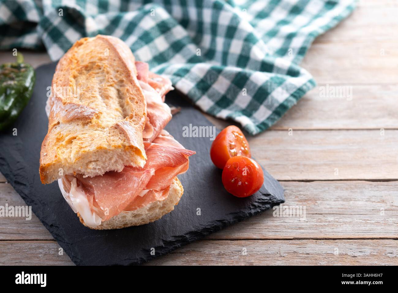 Spanish serrano ham sandwich. Spanish bocadillo de jamon serrano Stock ...