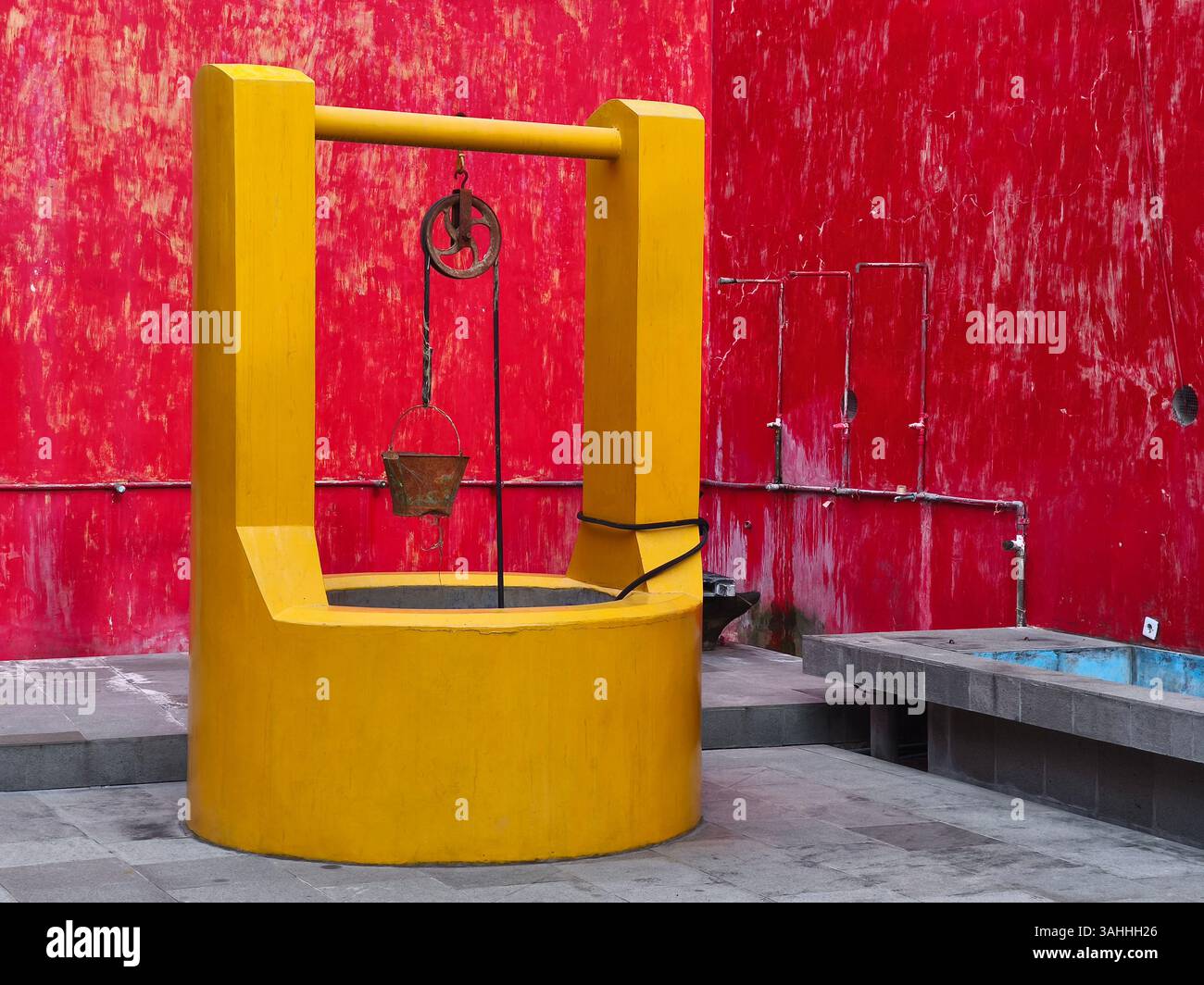 an old well water source inside the Red House in the historic old ...