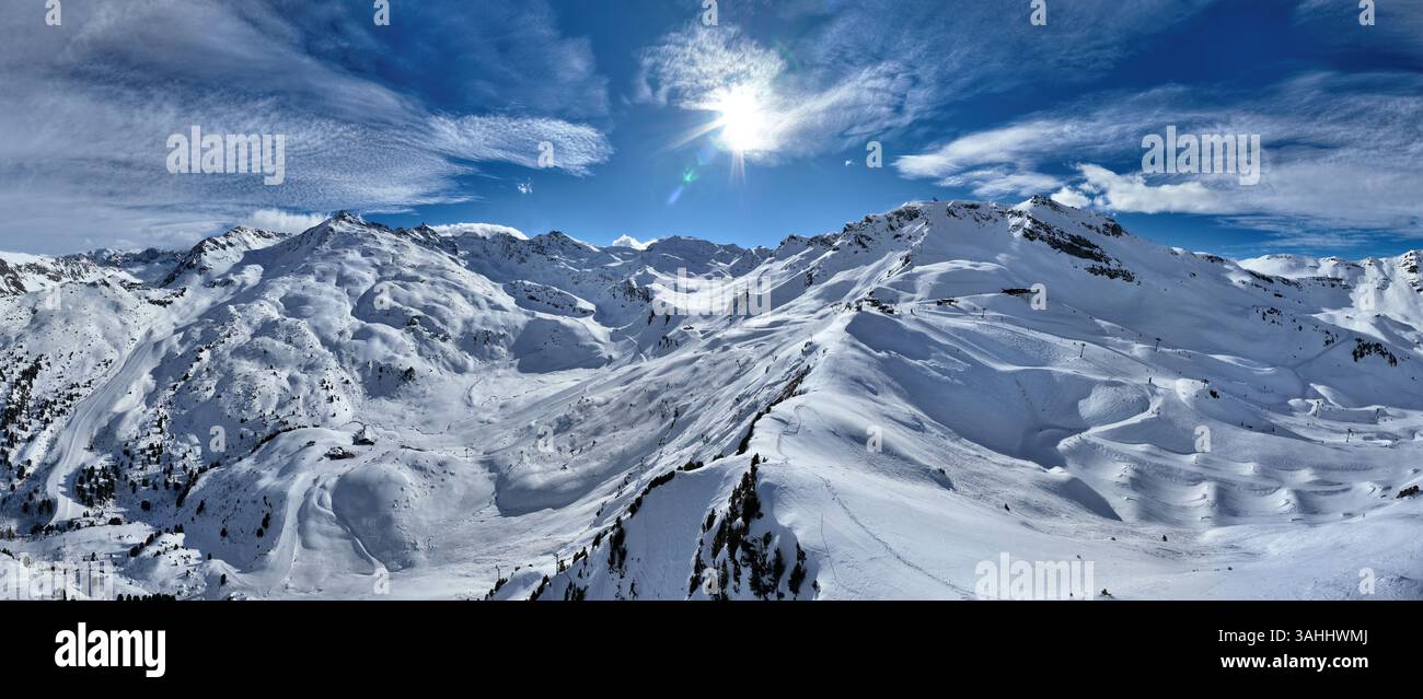 A breathtaking aerial view of a beautiful winter landscape with snow ...