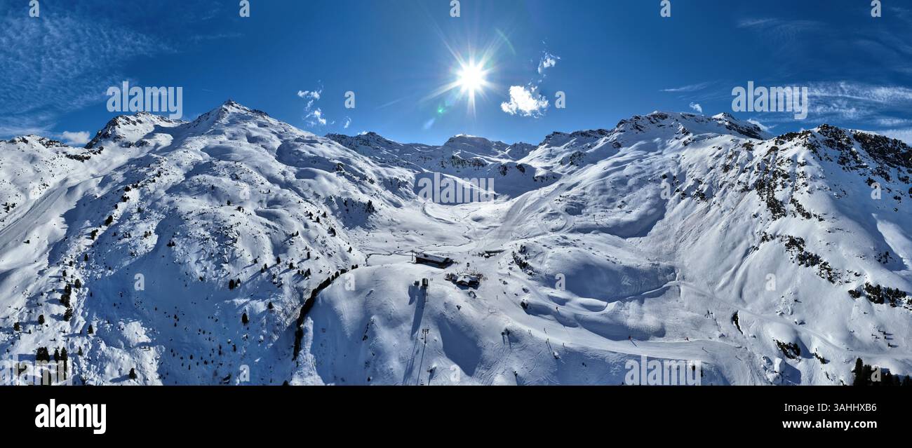 A breathtaking aerial view of a beautiful winter landscape with snow ...