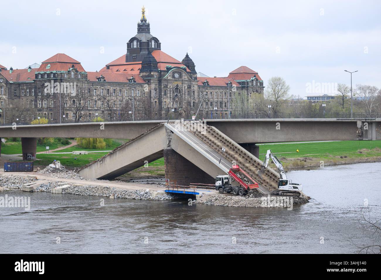 10 April 2025, Saxony, Dresden: Construction vehicles are working on ...