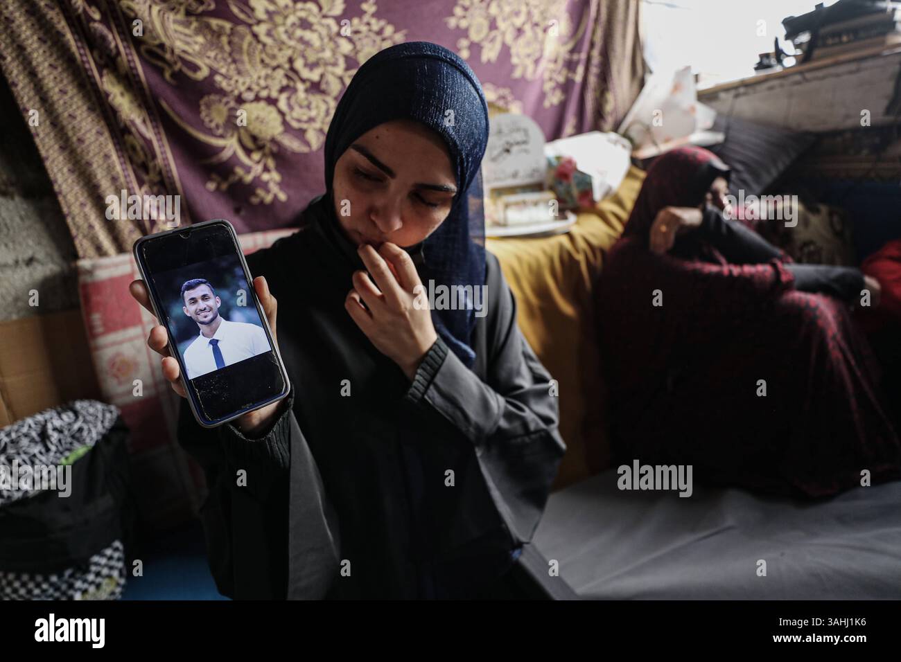 Palestinian girl Malak Abu Al-Omreen, 20 years old, is displaced with ...