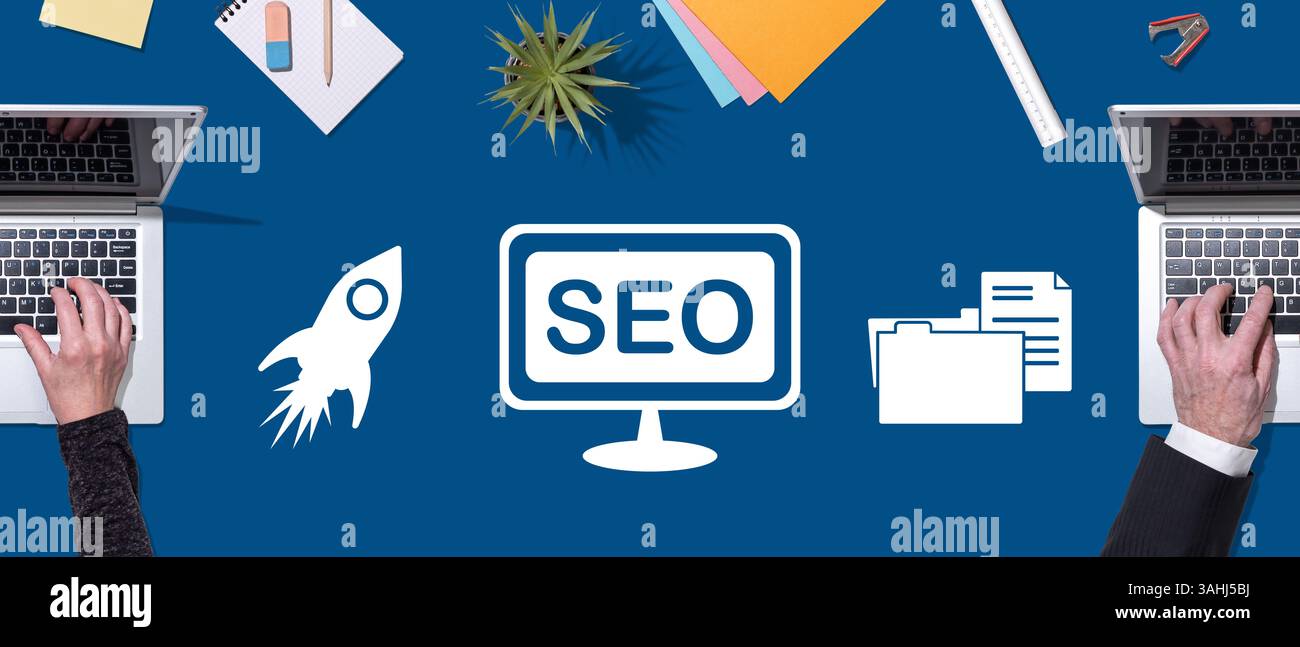 Top view of hands using laptop with symbol of search engine optimization concept Stock Photo - Alamy