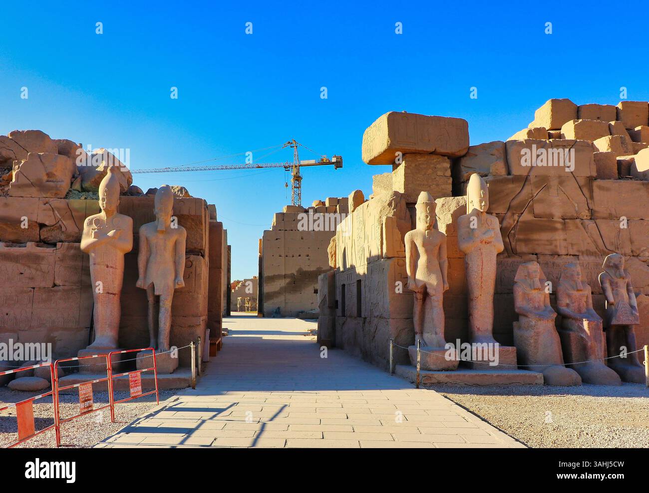 Mirror image Statues of Thutmose III and Osiris with cartouche of ...