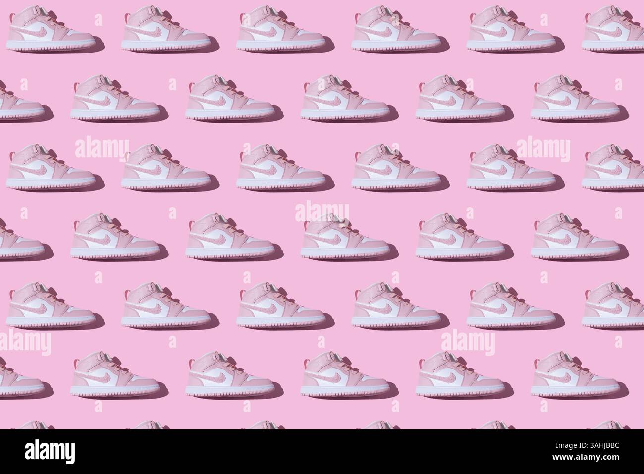Pink Air Jordan 1 Mid sneaker pattern on a pink background. Sneakers ...