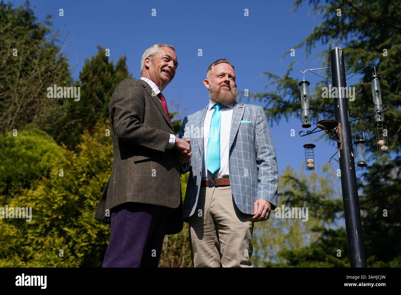 Reform UK leader Nigel Farage having his photograph taken with his ...