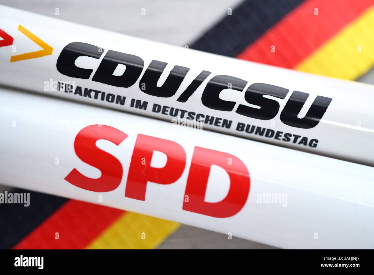 Ballpoint pen of cdu csu and spd on german flag hi-res stock ...
