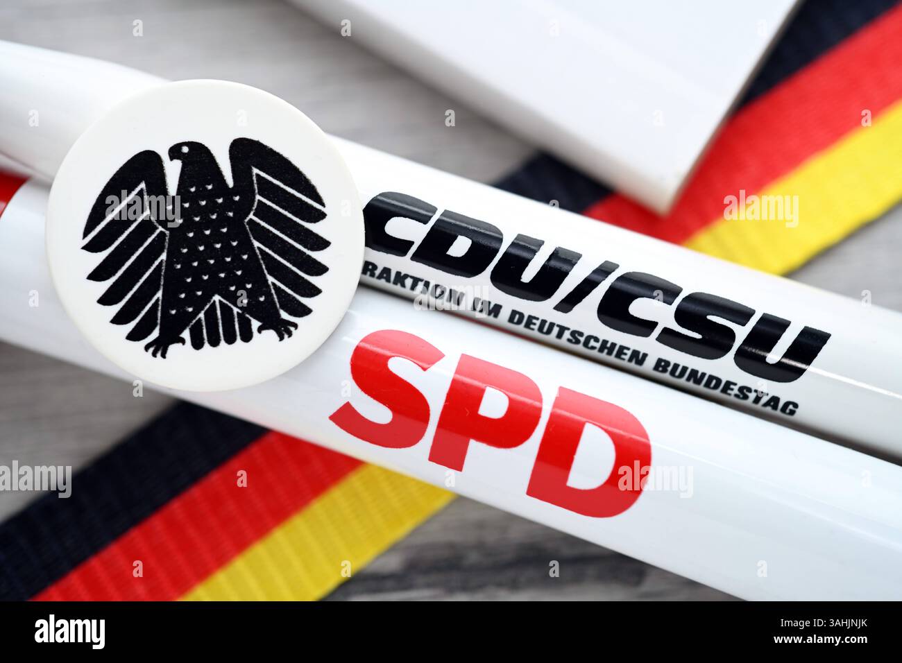 Ballpoint pen of cdu csu and spd on german flag hi-res stock ...
