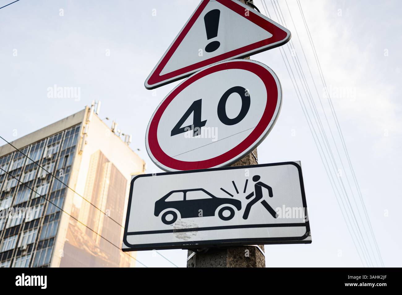 Street signs including speed limit and pedestrian warning located in an ...