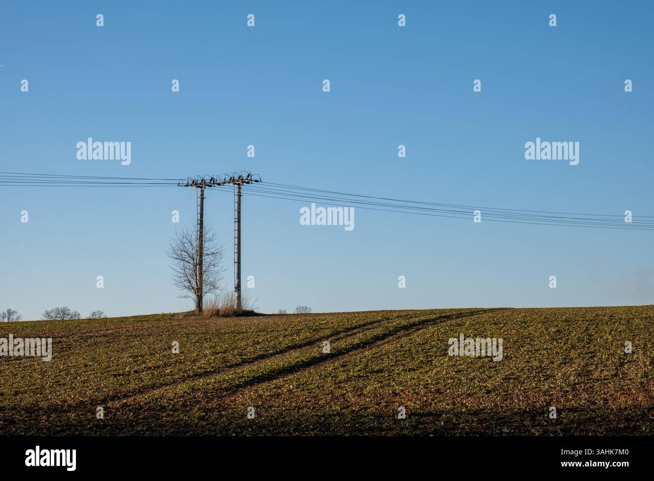 Power lines on slope hi-res stock photography and images - Alamy