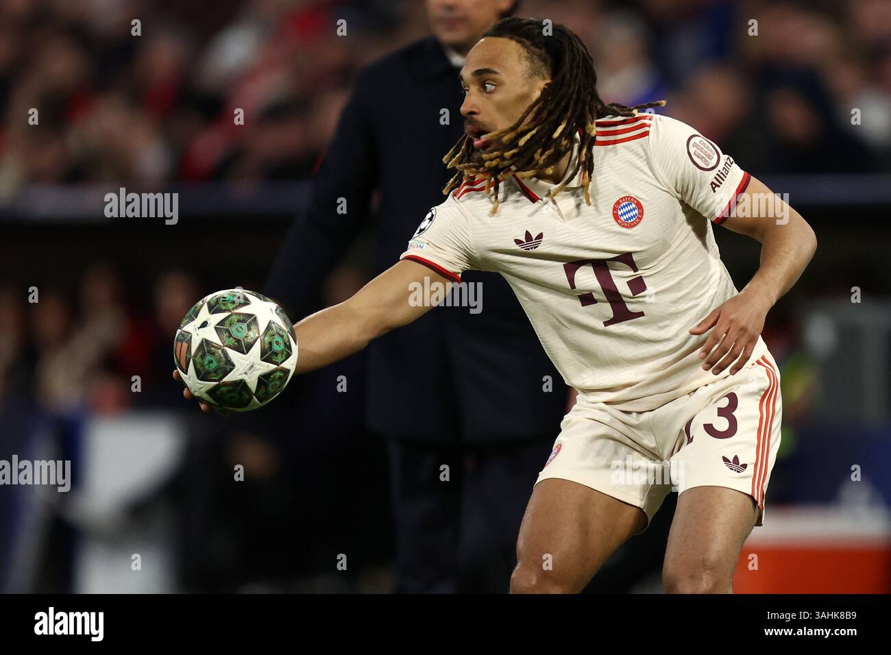 Sacha Boey of FC Bayern Munchen controls the ball during the UEFA ...
