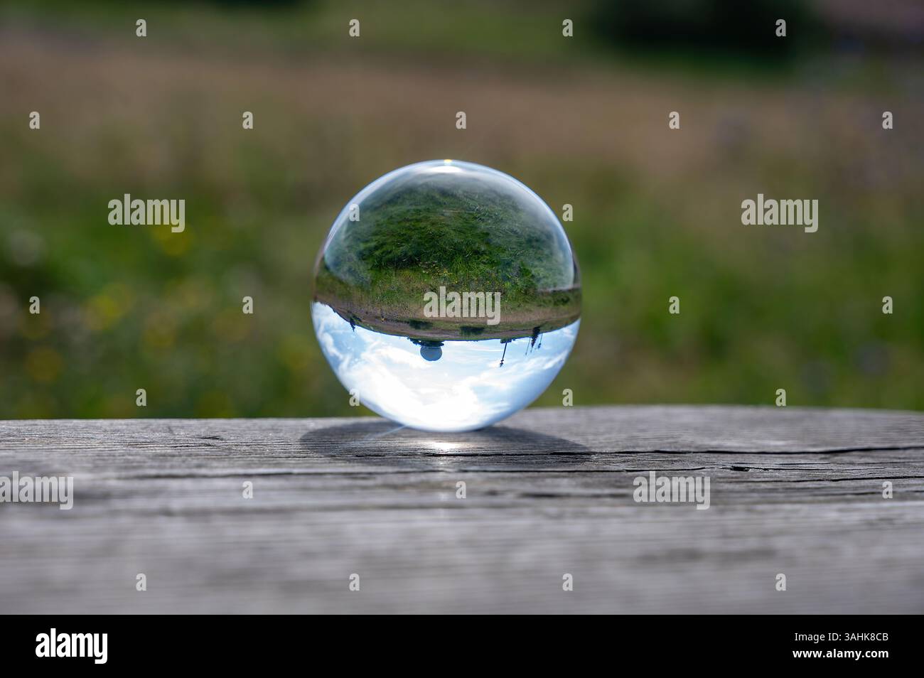 Glass ball on wood with reflection of the radar dome - radome on the ...