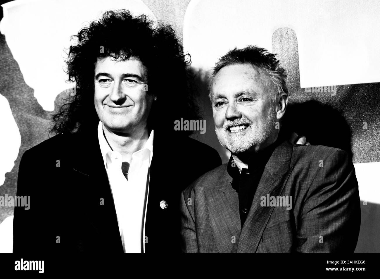 Rock guitarist brian may Black and White Stock Photos & Images - Alamy