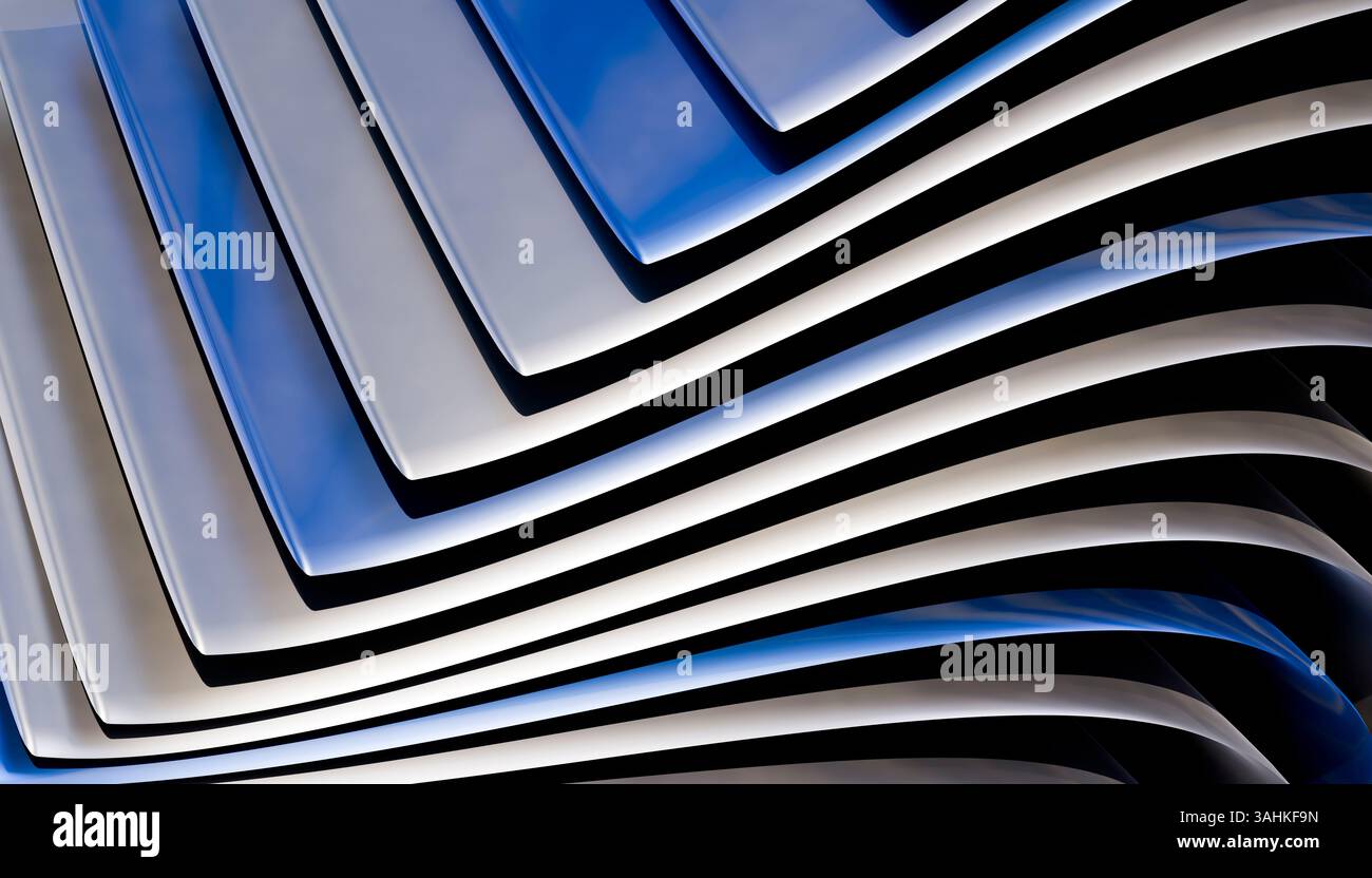 Abstract pattern of overlapping blue and white metallic sheets creating ...