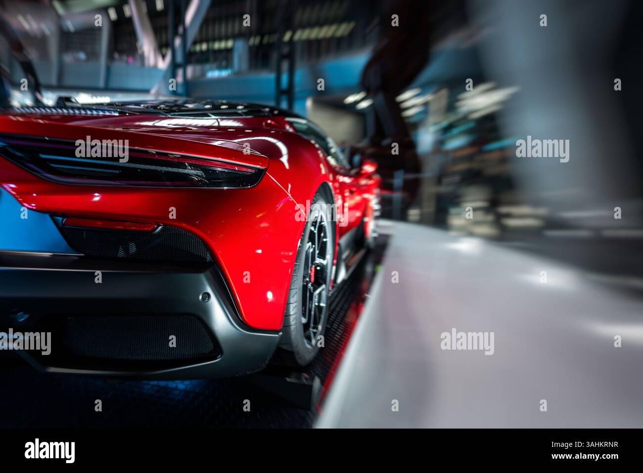 Stunning Red Sports Car Rear View in Showroom Display, Elegant Crimson ...