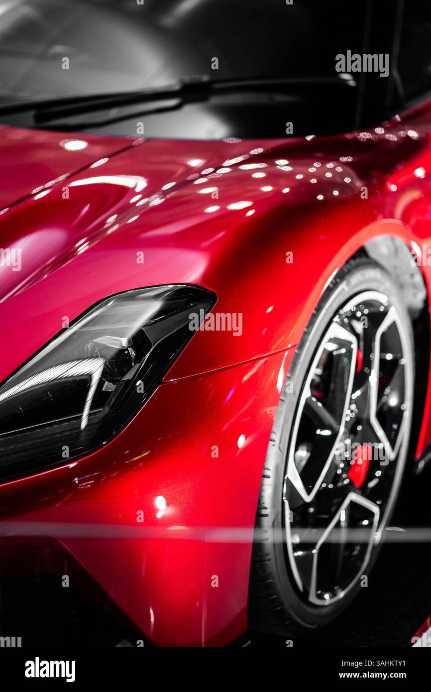 Bold Red Sports Car Front View in Showroom Spotlight, Striking Crimson ...