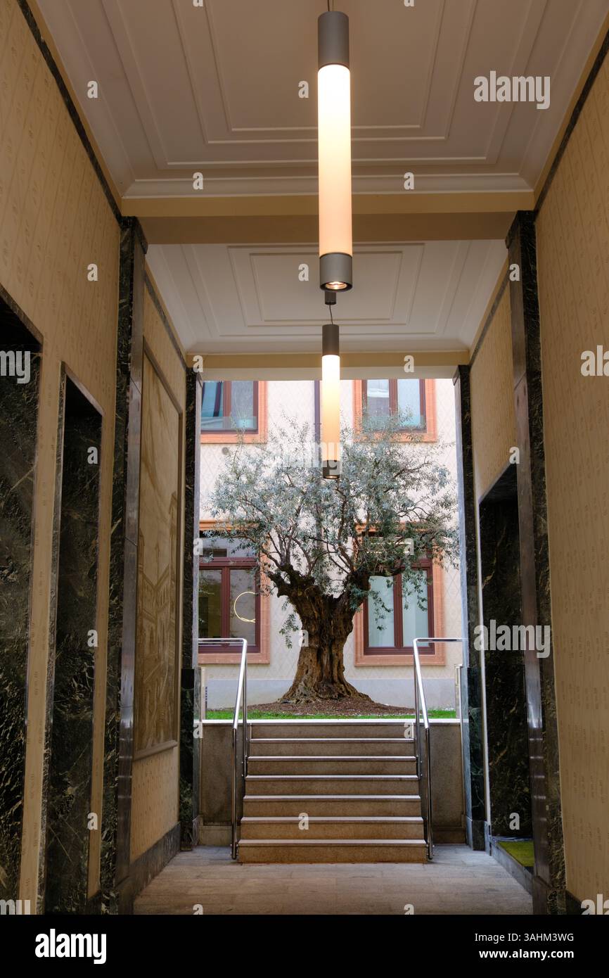 Entryway of old residential building along via Petrarca in Milan ...