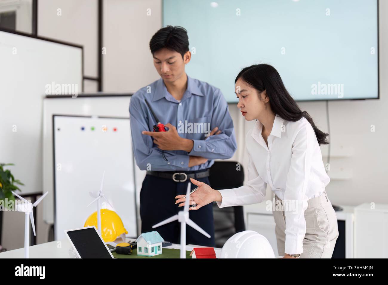 Team Collaboration on Sustainable Engineering. Engineers brainstorming ...