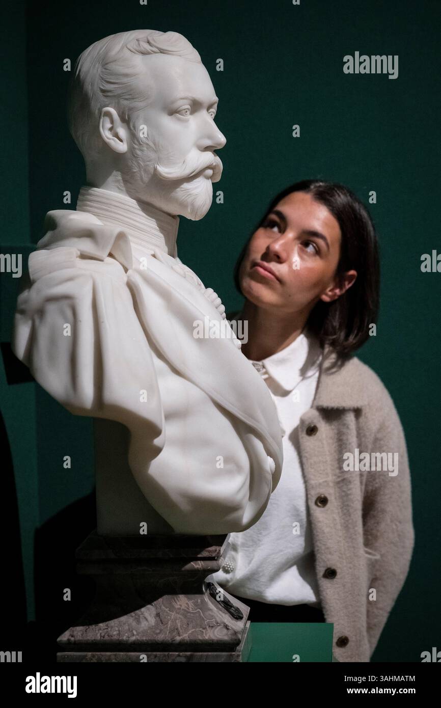 London, UK. 10 April 2025. A staff member with ‘King George V when Duke ...