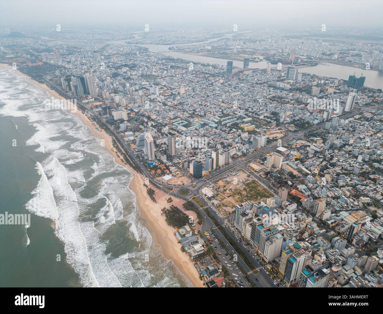 Aerial View of Da Nang City Showcasing Its Vibrant Beach and Urban ...