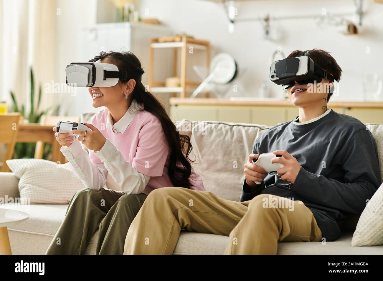 Couple engages in an immersive gaming session, bonding over virtual ...