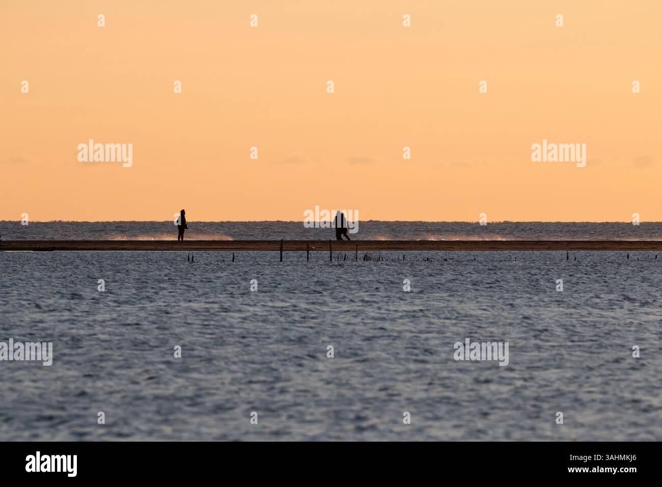 Sunset Love on a Winter Shore Stock Photo - Alamy