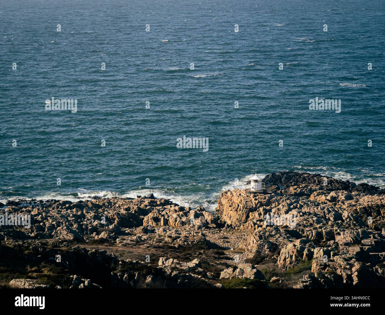 A beautiful and rugged rocky coastline in Sweden, with stunning sea ...