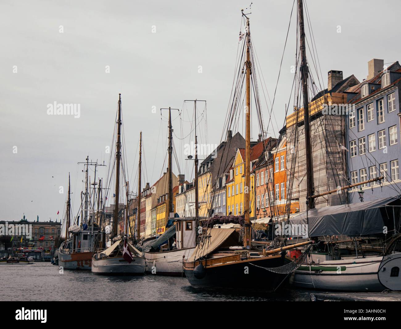 Nyhavn is a lively harbor area in central Copenhagen, Denmark, known ...