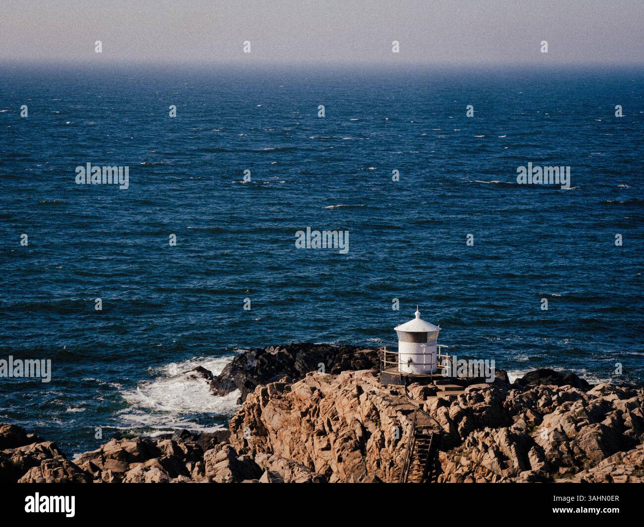 A beautiful and rugged rocky coastline in Sweden, with stunning sea ...