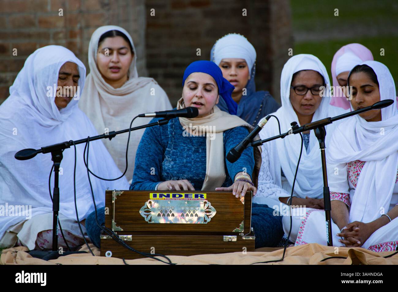 Traditional Arabic women musicians performing live outdoors, cultural ...
