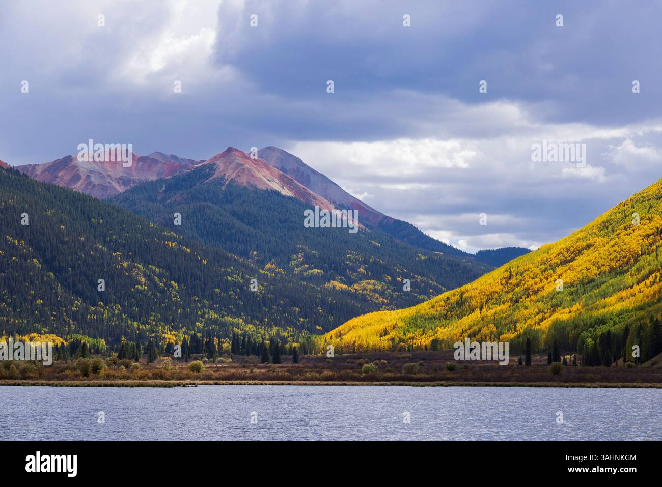 Colorado aspens autumn fall green yellow clouds fall colors lake stormy ...