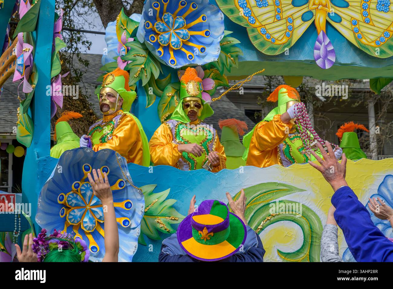 New Orleans, LA, USA - March 4, 2025: Krewe of Rex riders toss beads ...