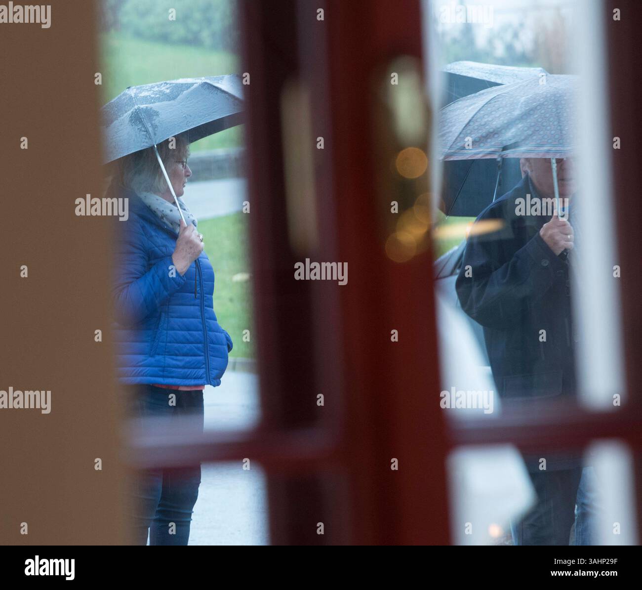 an umbrella as a protection against rain on the outside umbrella as ...