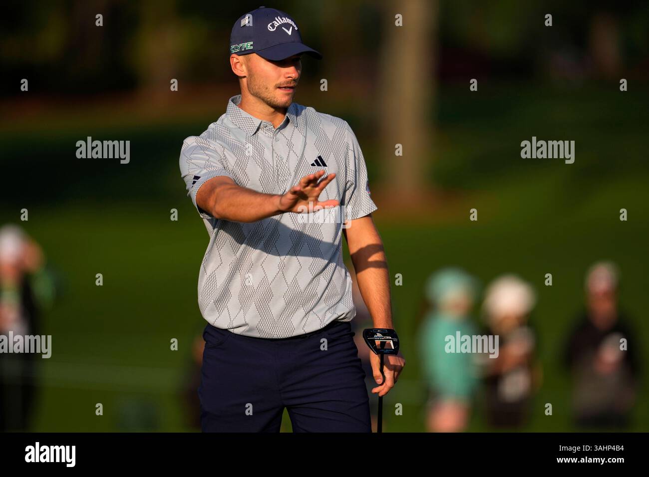Nicolai Hojgaard, Denmark, reacts after missing a putt on the second ...