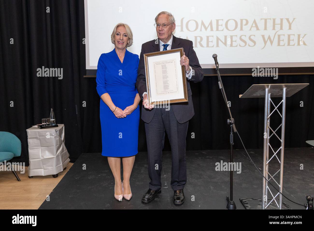 (L) Homeopathy UK CEO Monica Price presents (R) HRH The Duke of ...