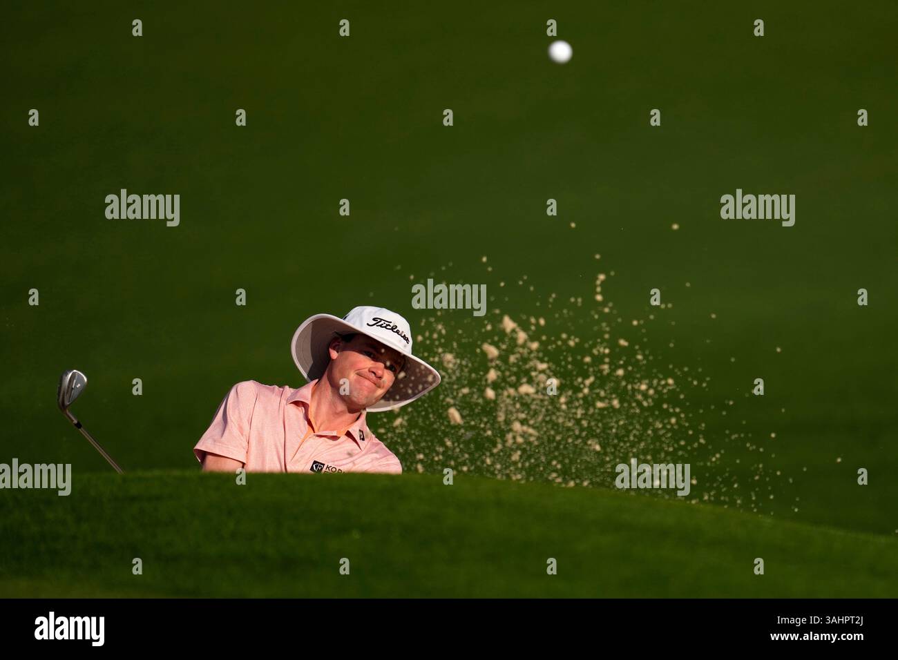 Joe Highsmith hits from the bunker on the second hole during the first ...