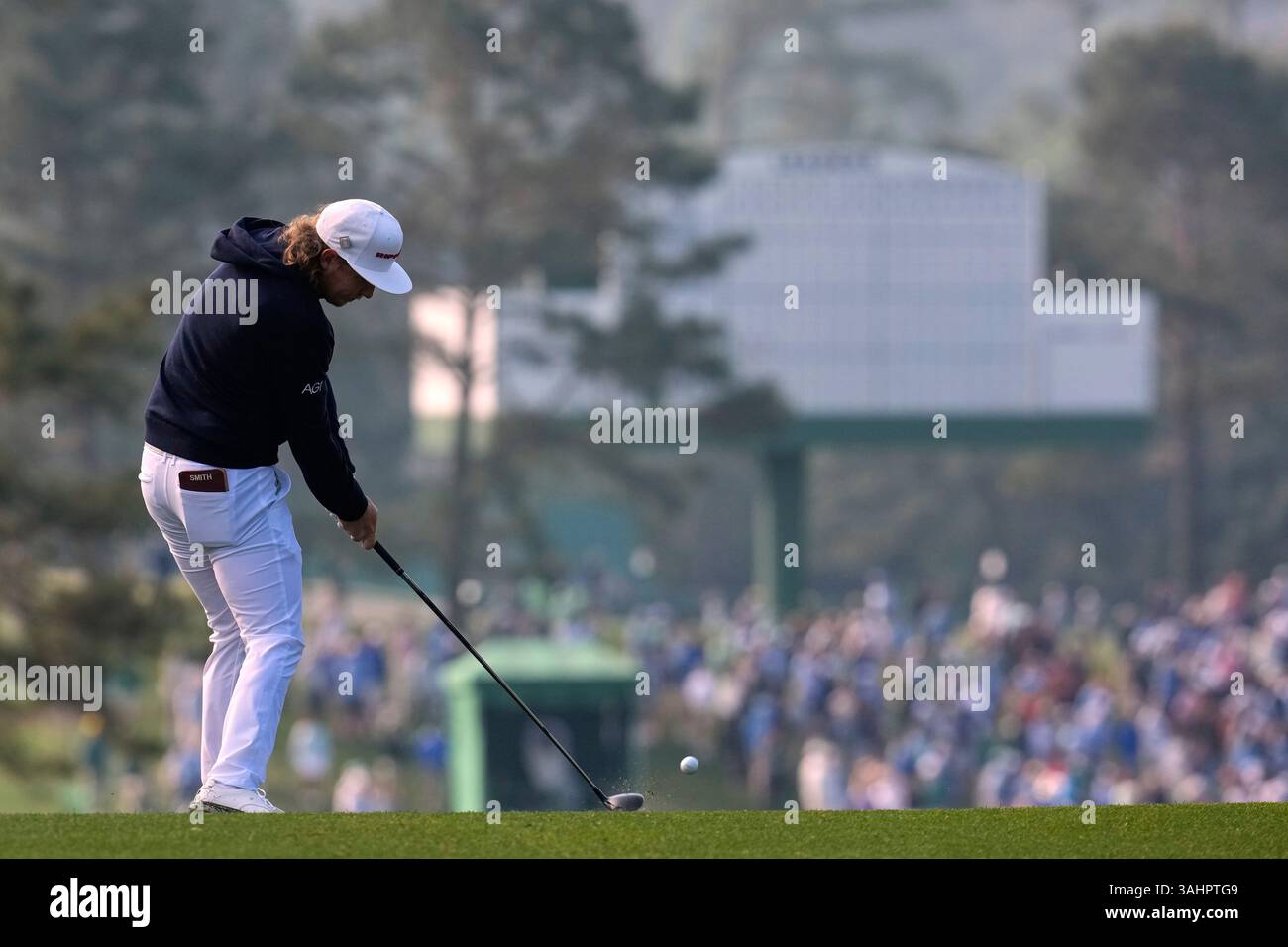 Cameron Smith, of Australia, hits from the fairway on the second hole ...