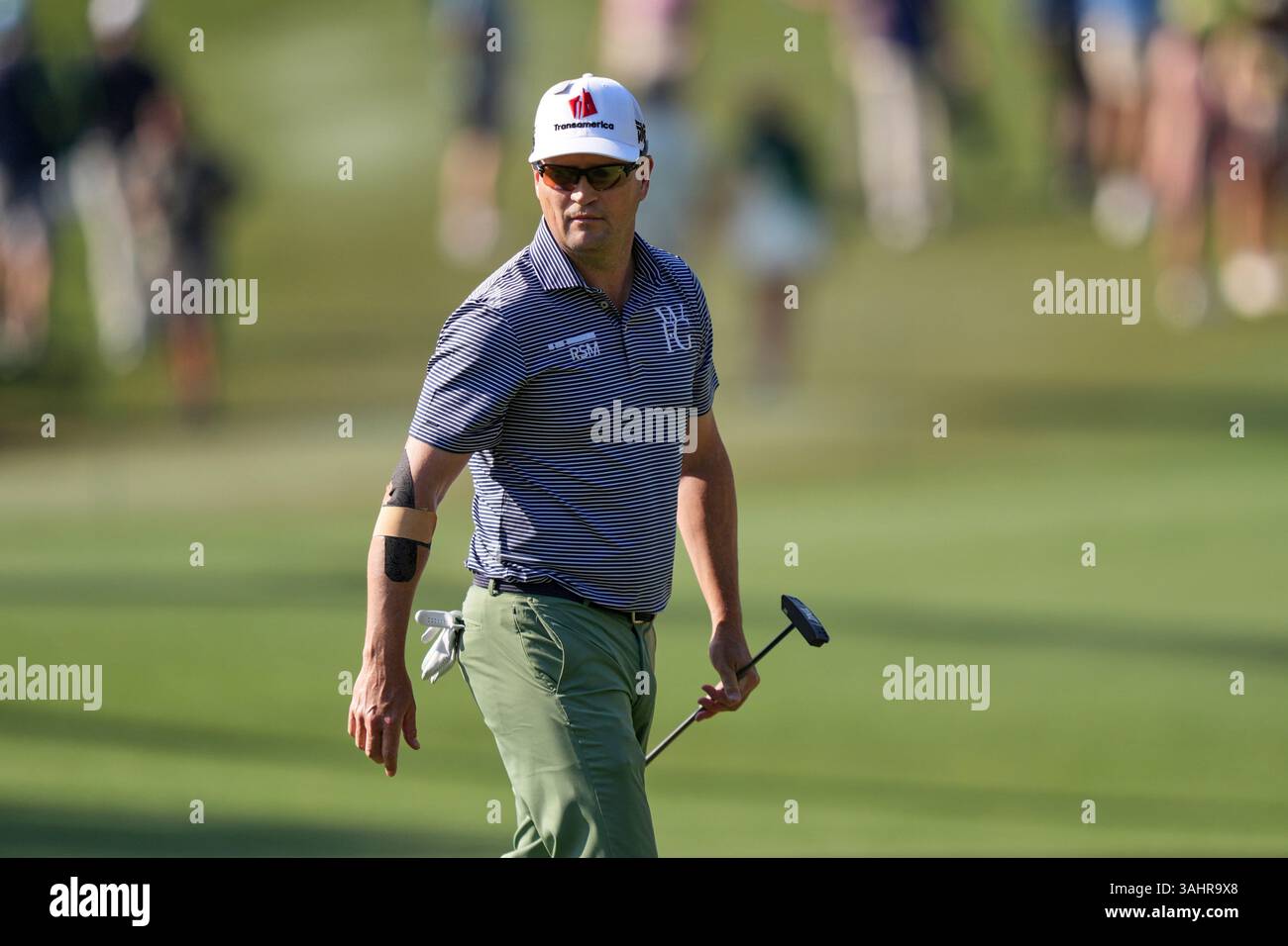Zach Johnson plays on the sixth hole during the first round at the ...