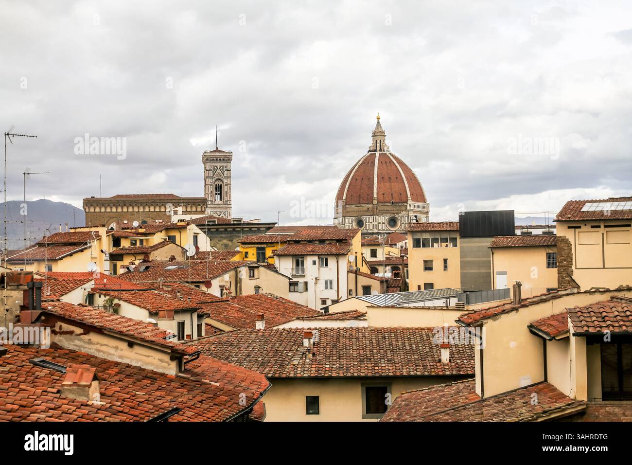 Roofs of houses and buildings with the dome in the background in ...