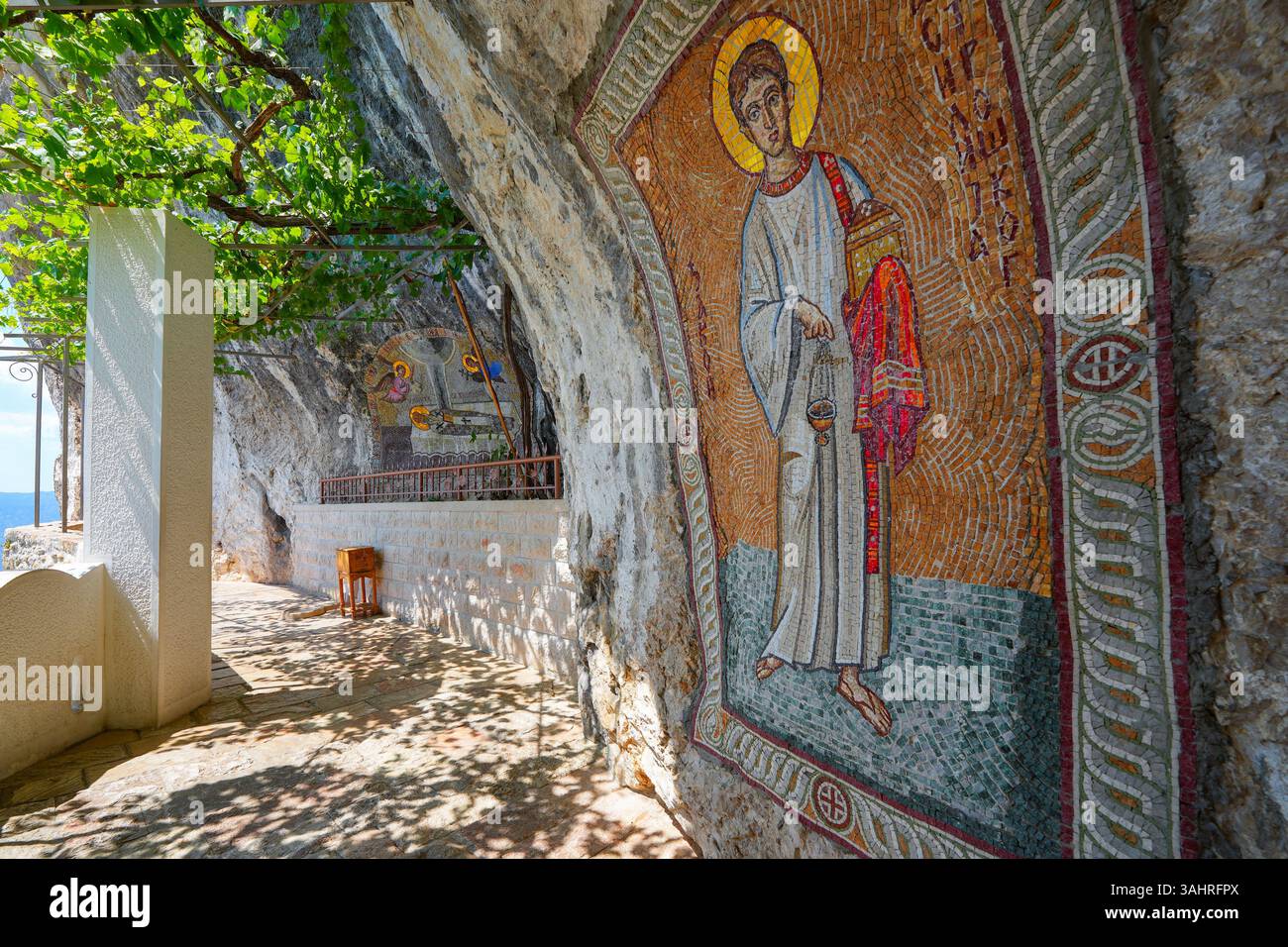 Mosaics on the rock face of the cliff where the upper Ostrog Monastery ...