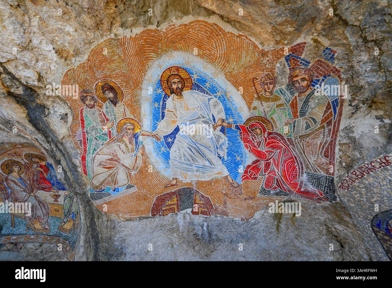 Mosaics on the rock face of the cliff where the upper Ostrog Monastery ...